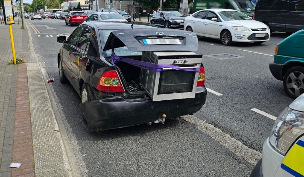 National: Phone-using driver with oven hanging out of the boot has car seized - Donegal Live