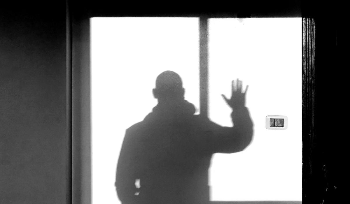 peeping through window